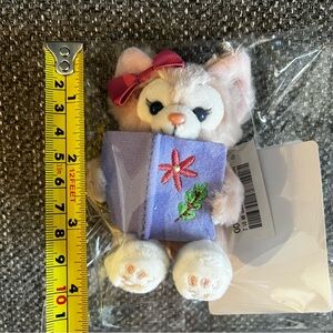 Disney | Toys | Bnwt Japan Tokyo Disneyland Plush Keychain Reading Book ...